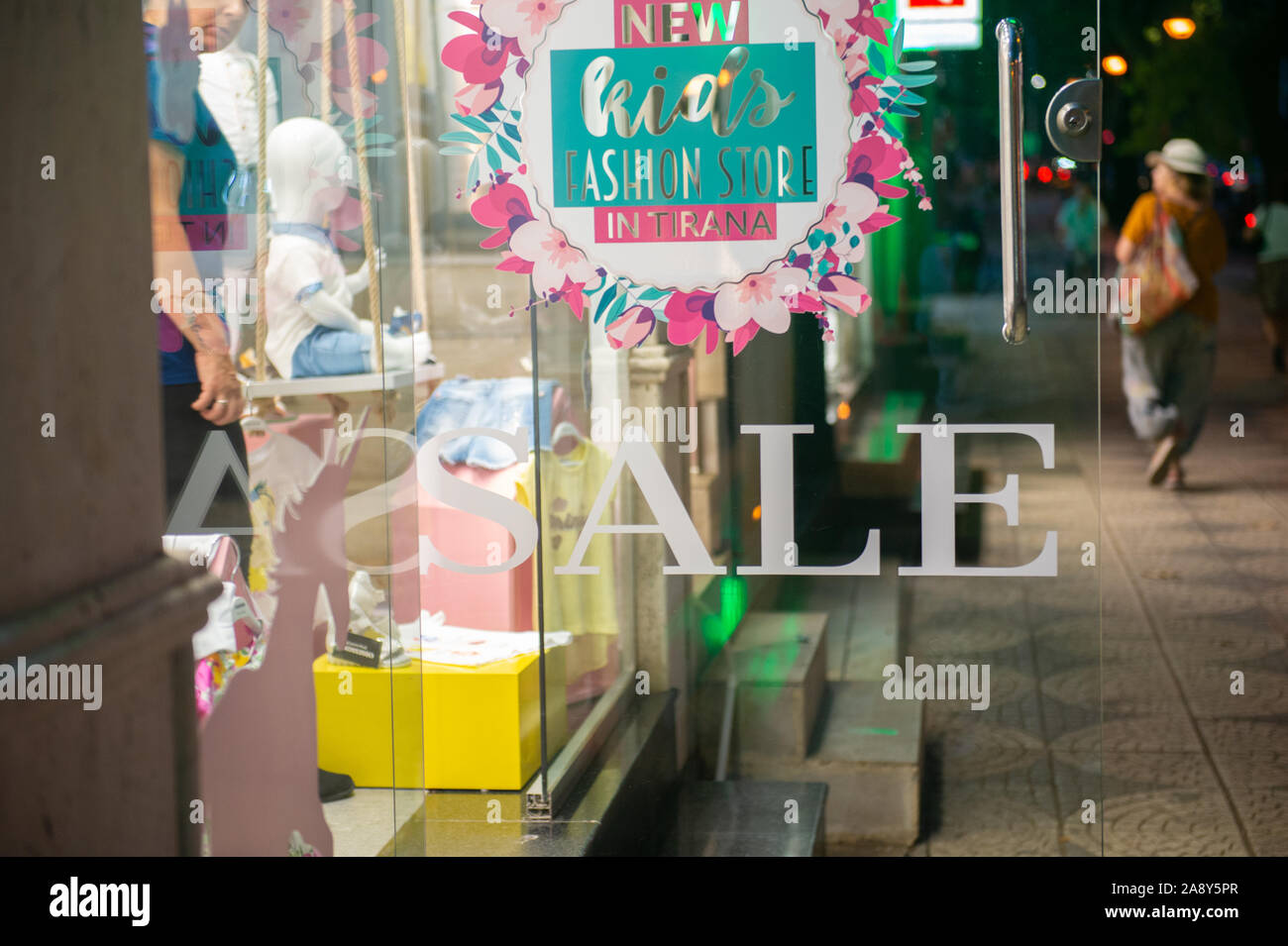 store showcase window display with text sale Stock Photo - Alamy
