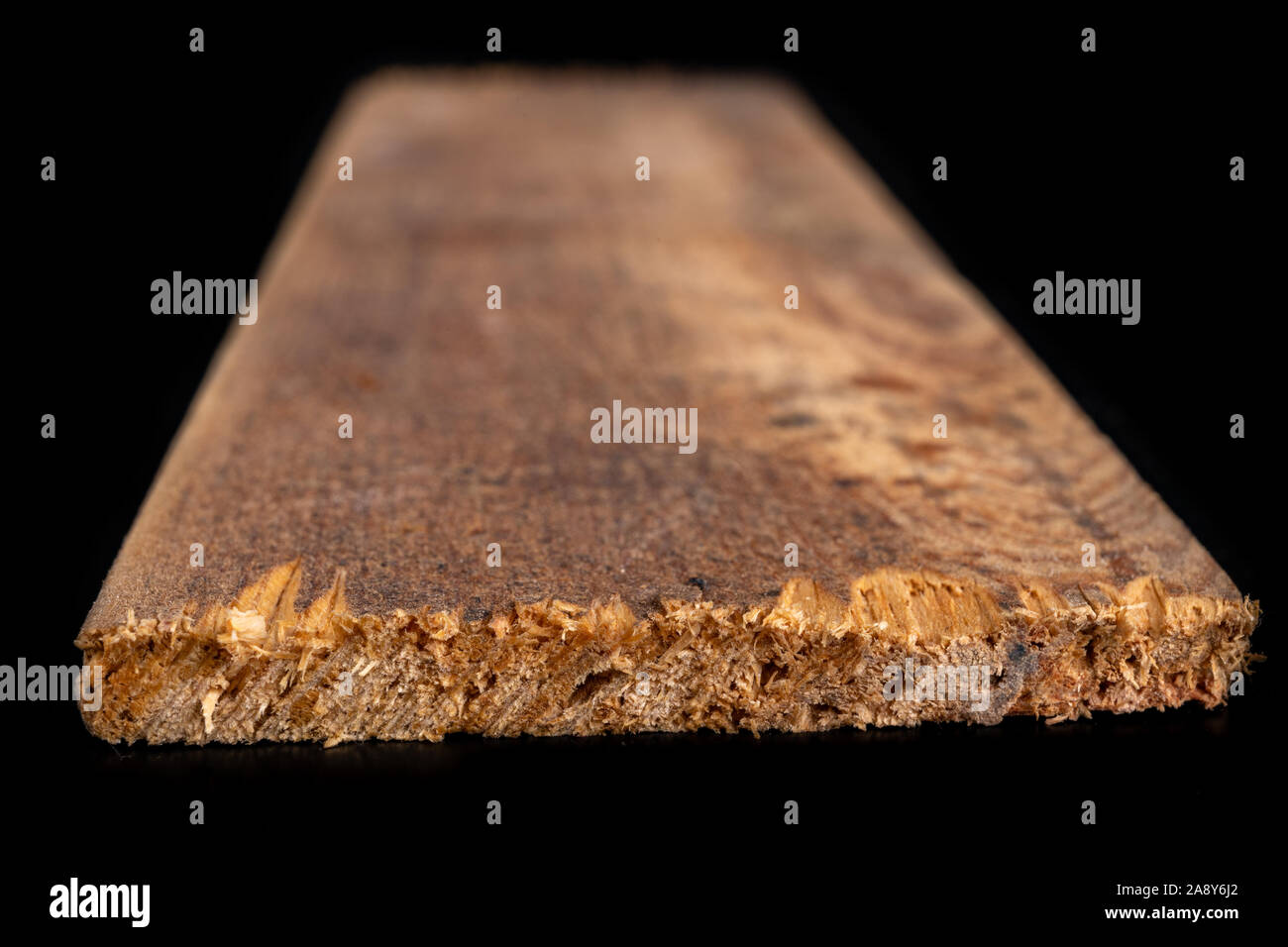 Raw wooden boards. Heavily jagged wood edges. Dark background Stock ...