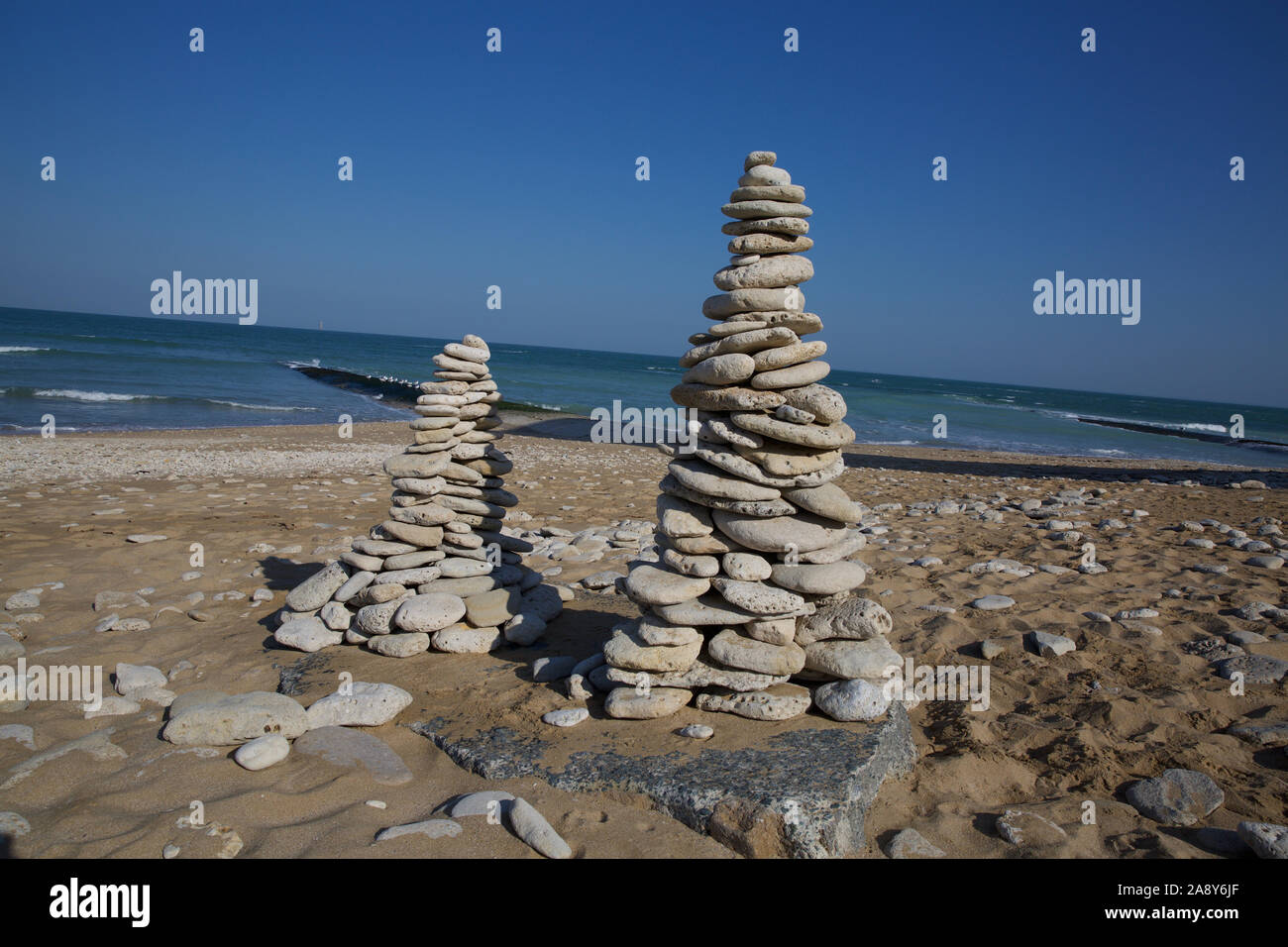 Pile of pebbles on a beach, France Stock Photo - Alamy