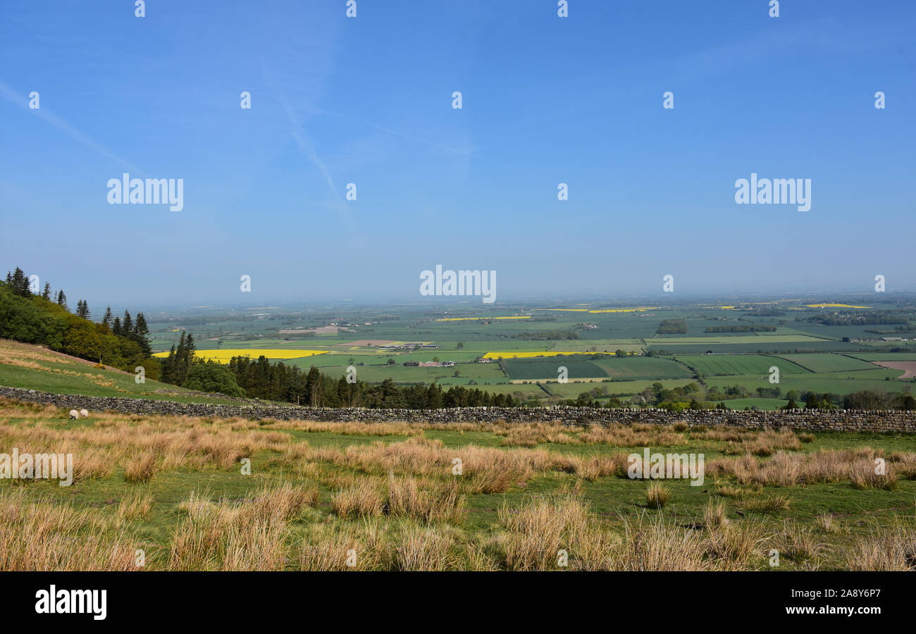 Stunning landscape with a stone wall dividing the landscape Stock Photo ...