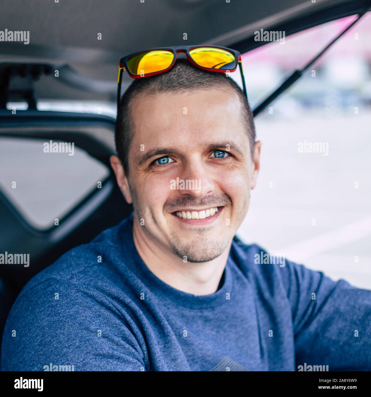 Closeup portrait of man with blue eyes looking in camera Stock Photo ...