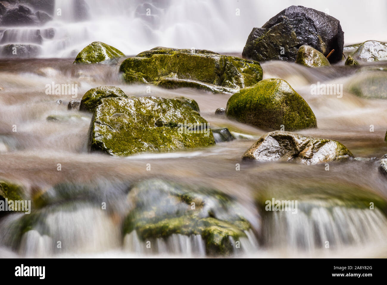 Closeup of rocks in a cascade Stock Photo - Alamy