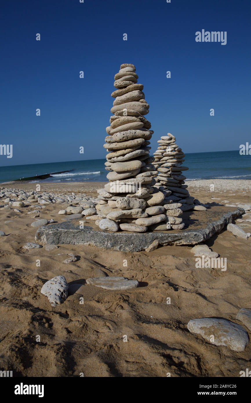 Pile of pebbles on sand hi-res stock photography and images - Alamy