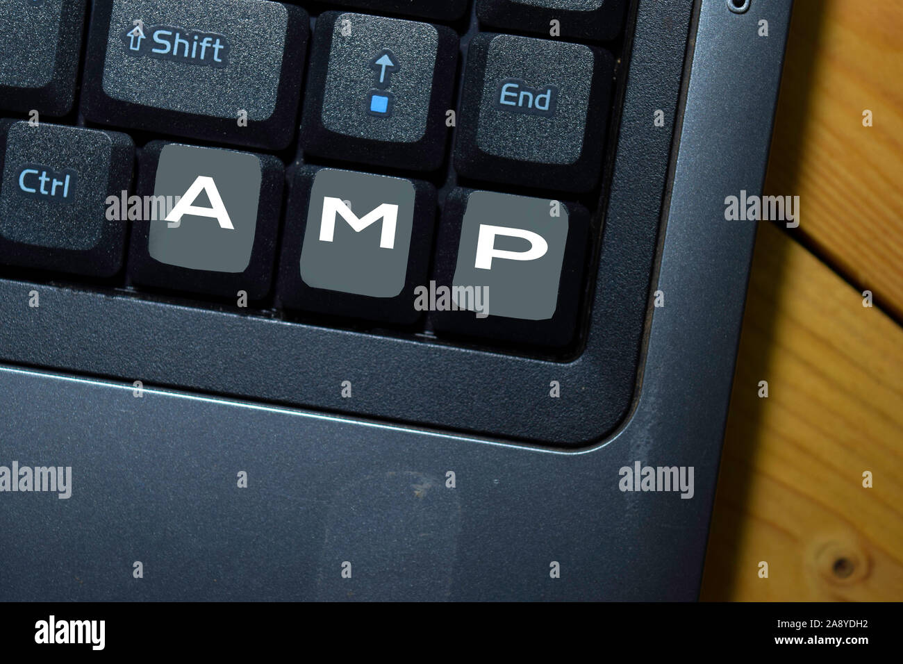 AMP write on keyboard isolated on laptop background Stock Photo - Alamy