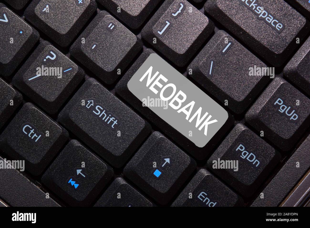 Neobank write on keyboard isolated on laptop background Stock Photo - Alamy