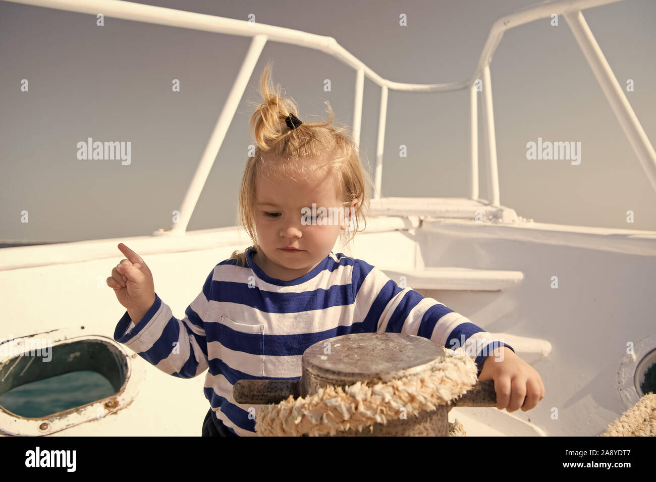 Collecting memories. Entertainment jobs. Baby boy enjoy vacation sea ...