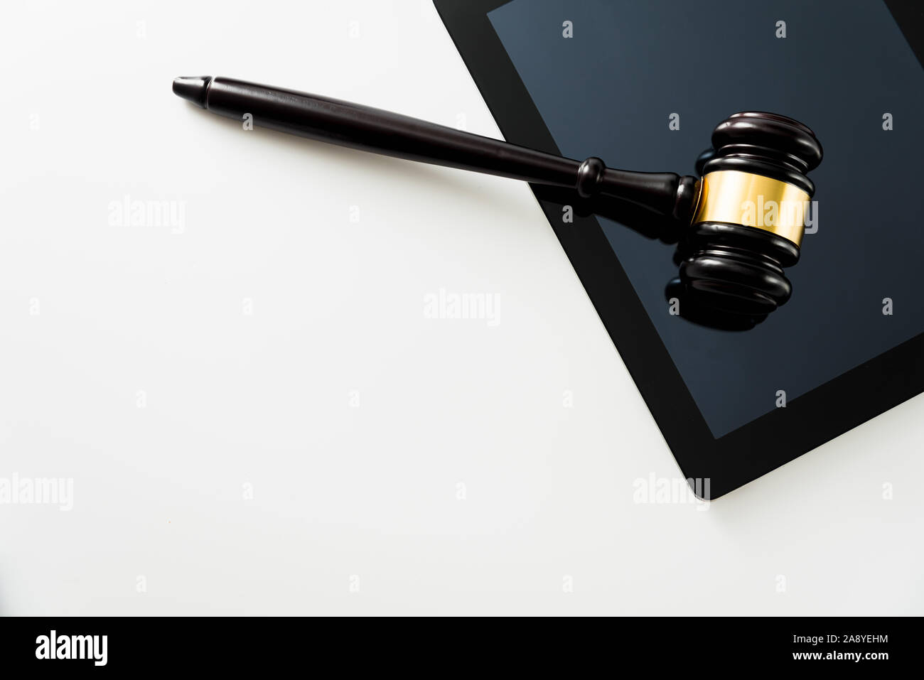 Gavel and tablet isolated on white background, copy space Stock Photo ...