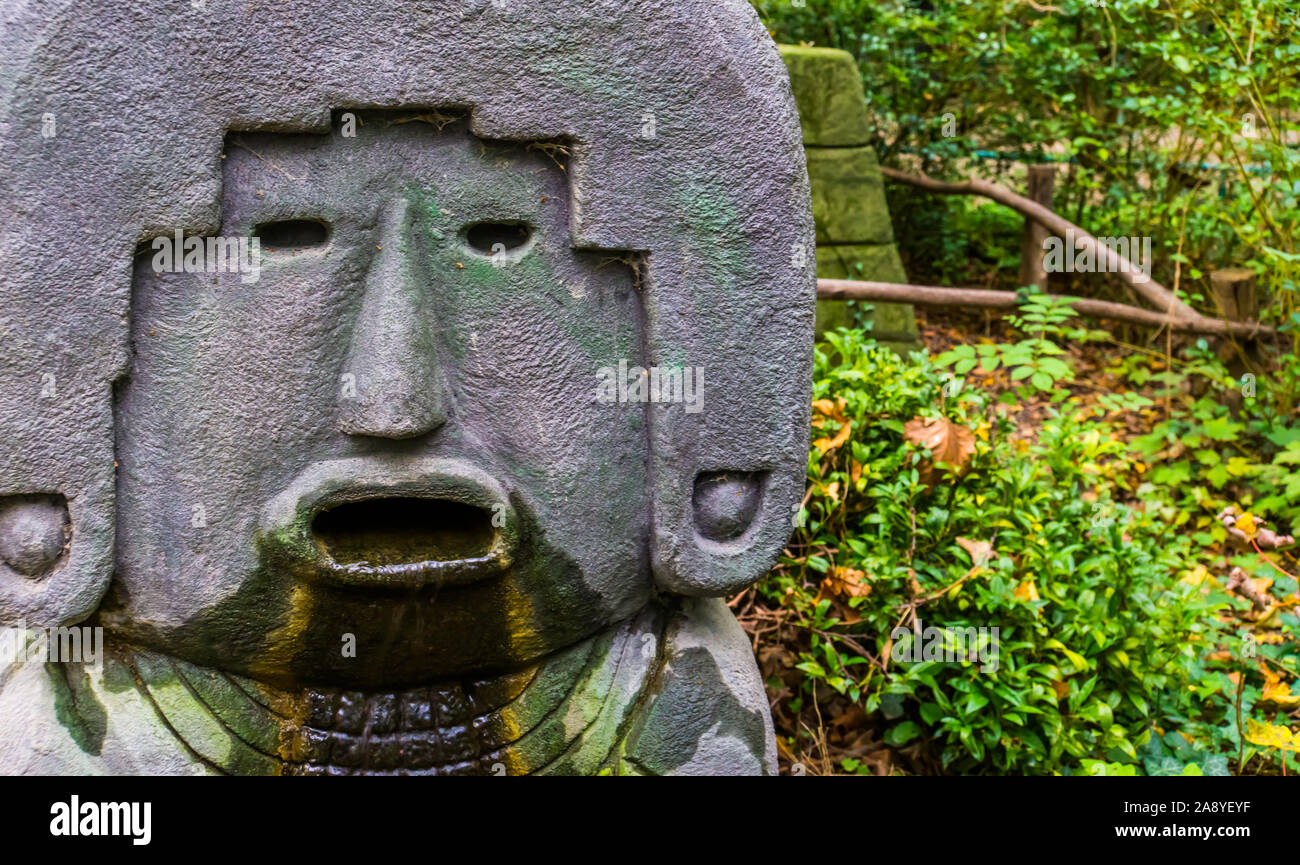 stone inca statue with water coming out its mouth, ancient culture ...