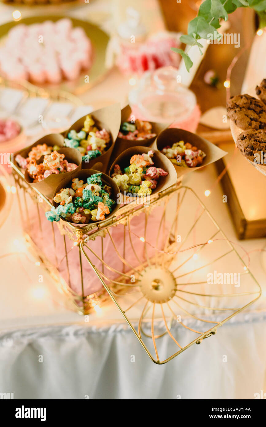 Candy bar beautifully decorated with sweets in a vintage event Stock ...
