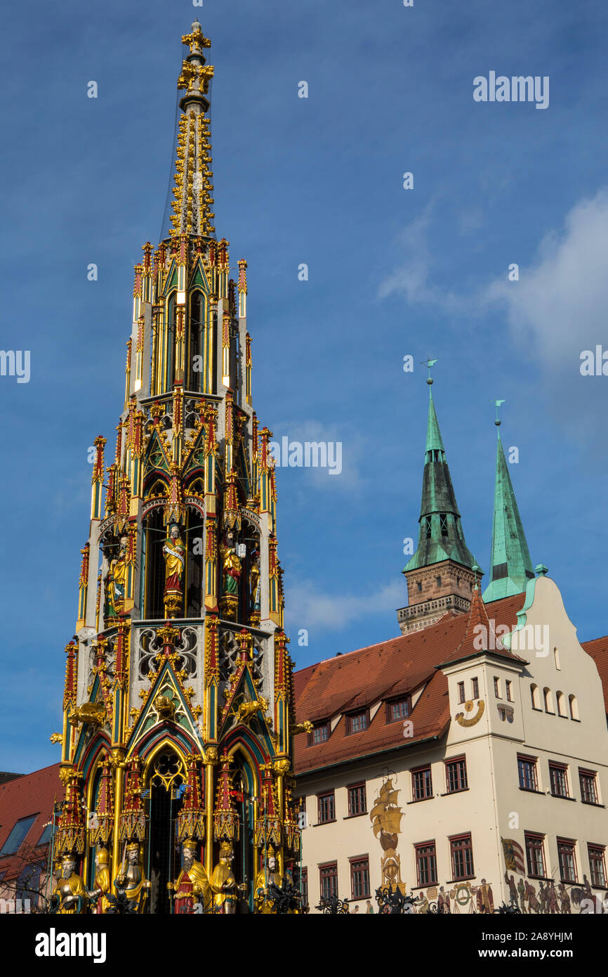 A view of the stunning Schoner Brunnen, known as the Beautiful Fountain ...