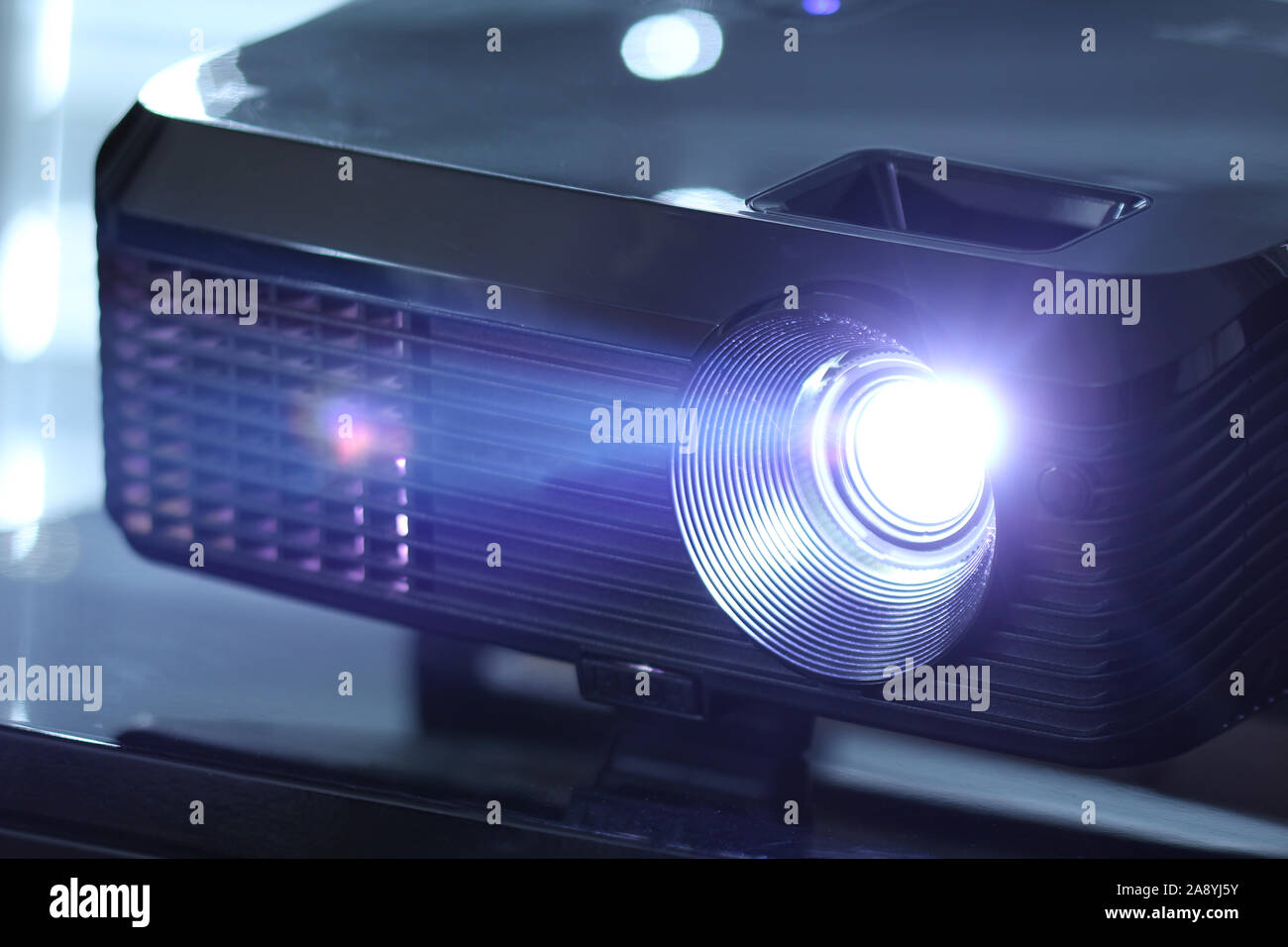 beamer light shining with a bright beam Stock Photo - Alamy