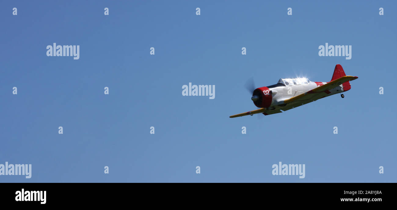 ww 2 plane in flight with blue sky Stock Photo - Alamy