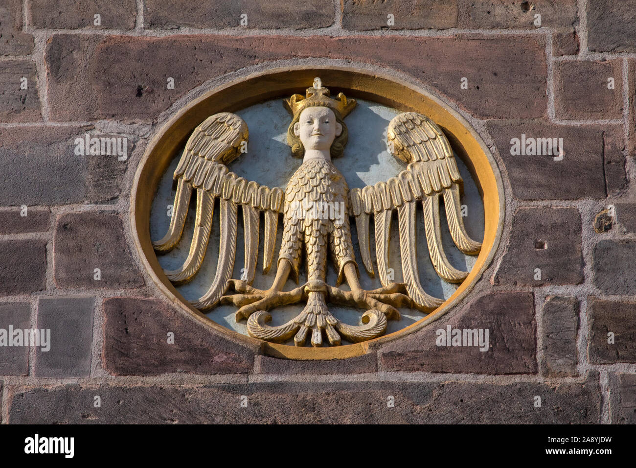 A close-up of a sculpture of the Nuremberg coat of arms, on the ...