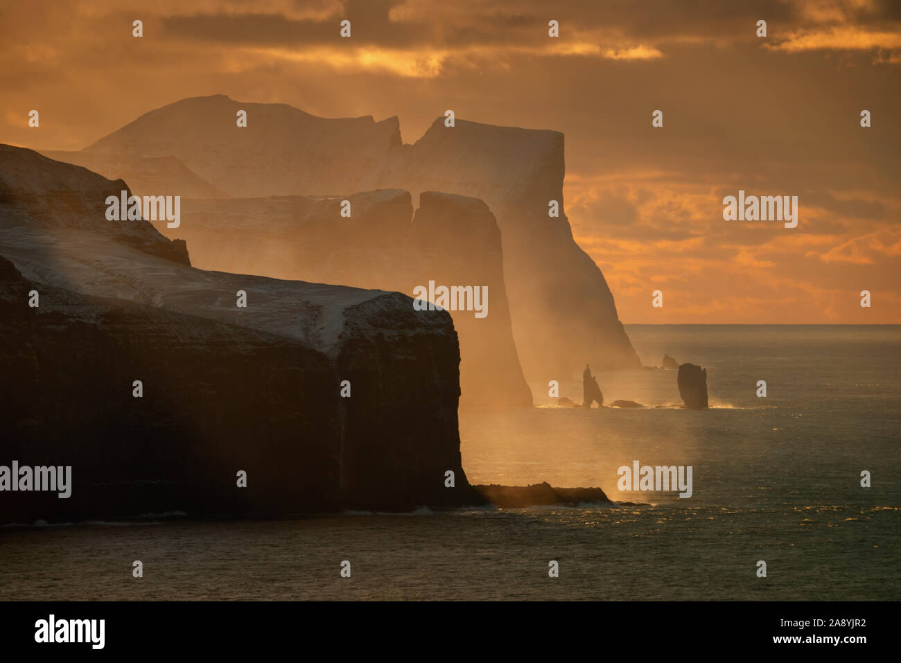 Streymoy and Eysturoy cliffs in sunset light, Faroe Islands Stock Photo ...