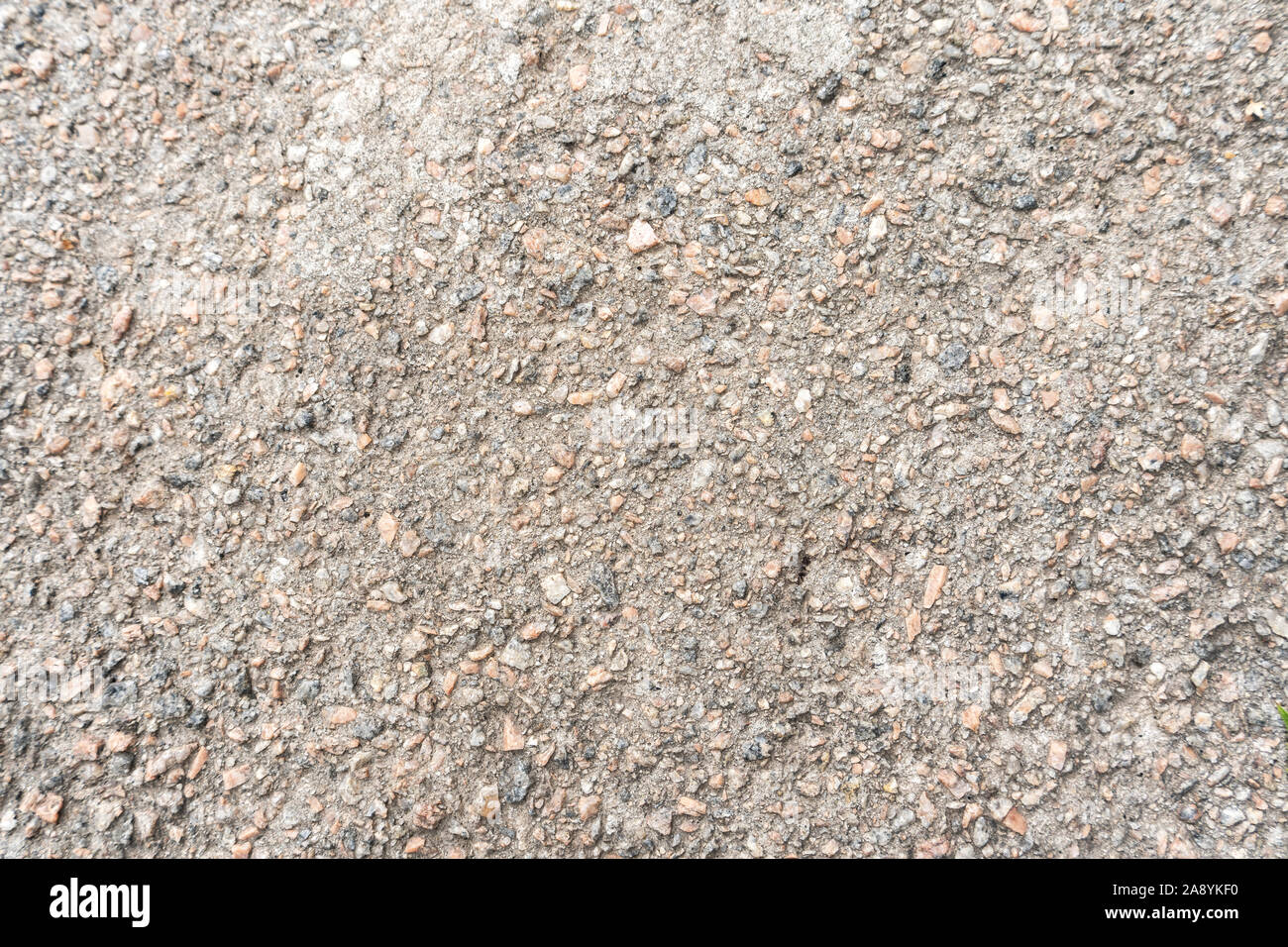 Background crushed stone poured into concrete. Crushed stone or gravel ...