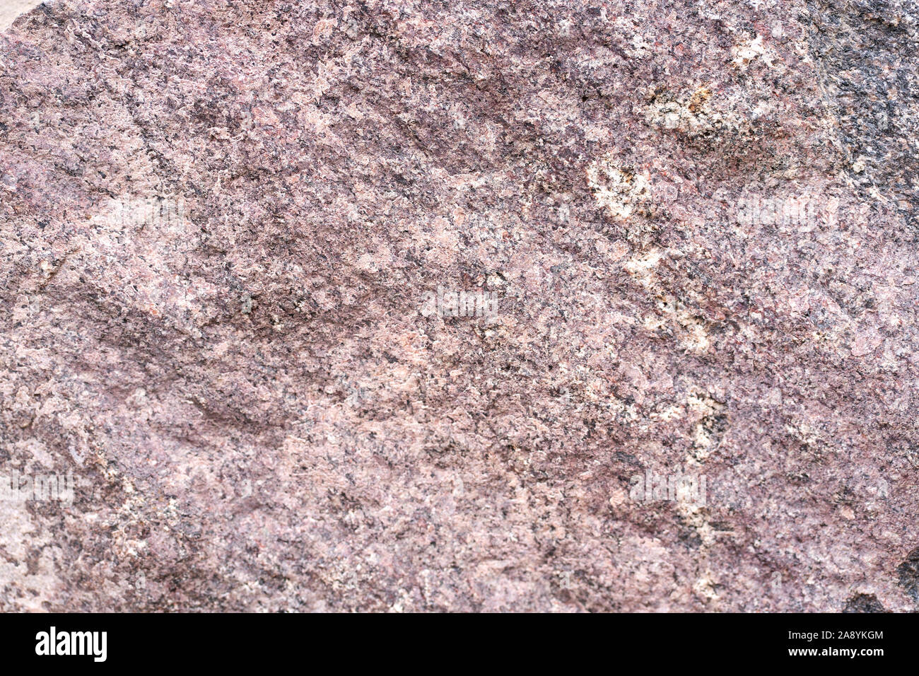 Porous stone texture. Granite wall cladding close up Stock Photo - Alamy