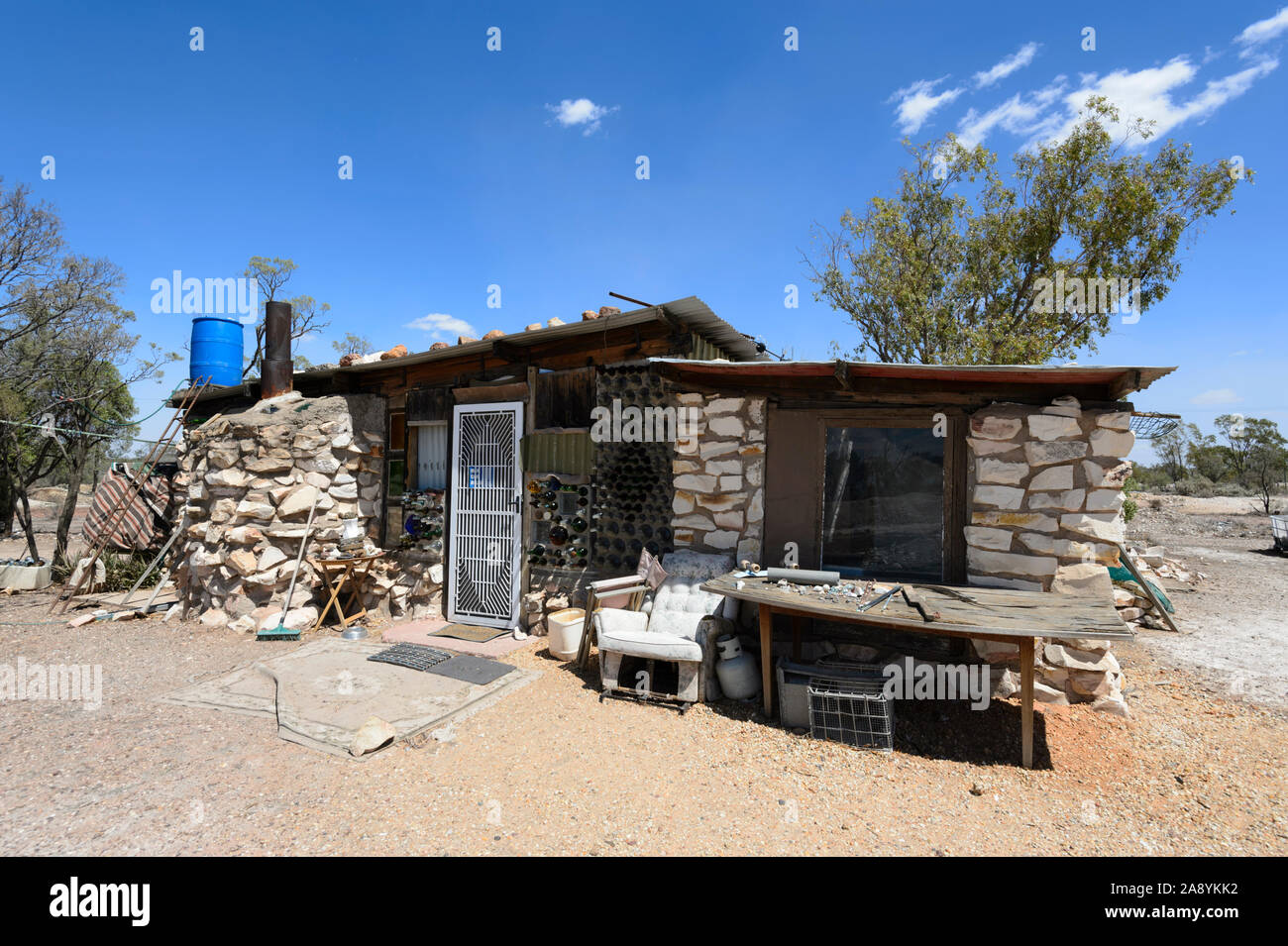 Abandoned stone shack, now a curio, in the opal mining fields of ...