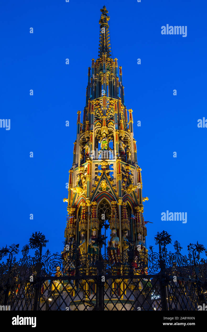 An evening view of the stunning Schoner Brunnen, known as the Beautiful ...