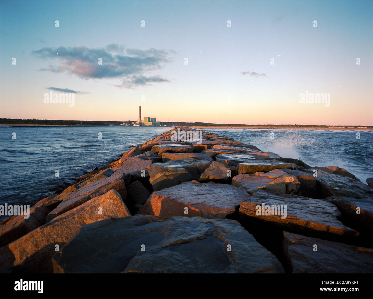 Power plant at the end of a jetty Stock Photo - Alamy