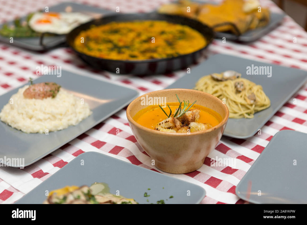 Detail of a prepared restaurant dinner table with miscellaneous recipes ...