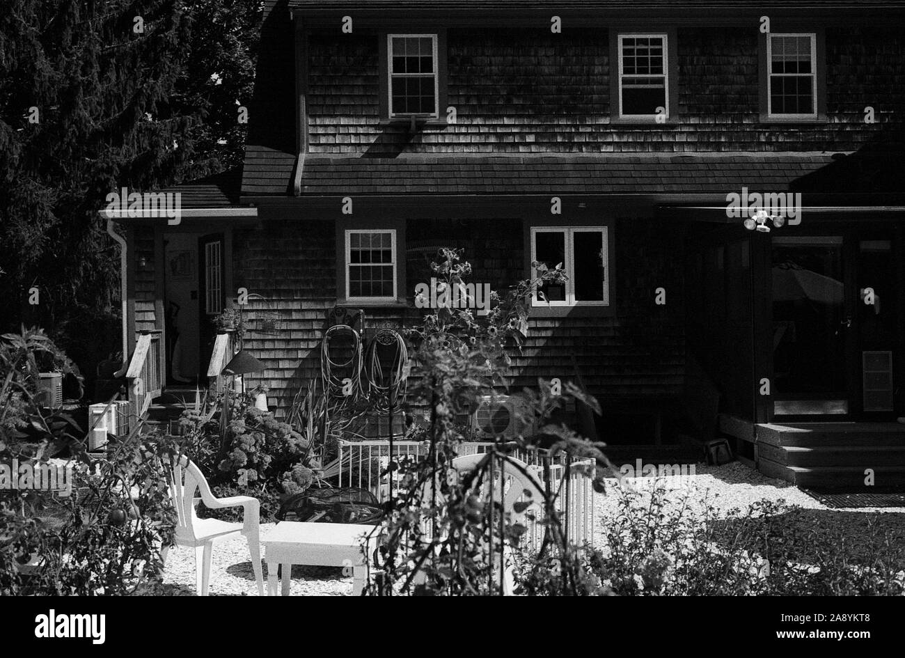 Black and White of a Back Yard of a Cape Cod House Stock Photo - Alamy