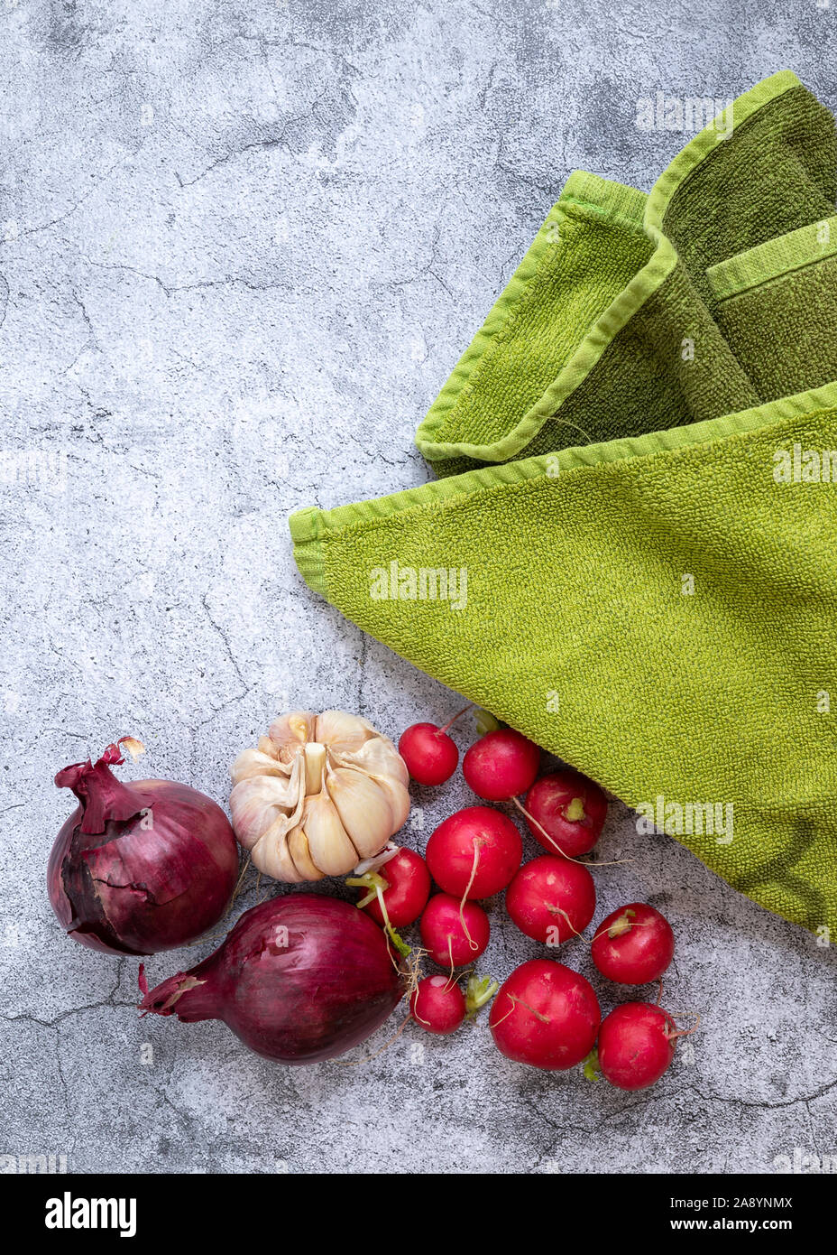 root vegetables and spices onions garlic radish overhead shot with ...