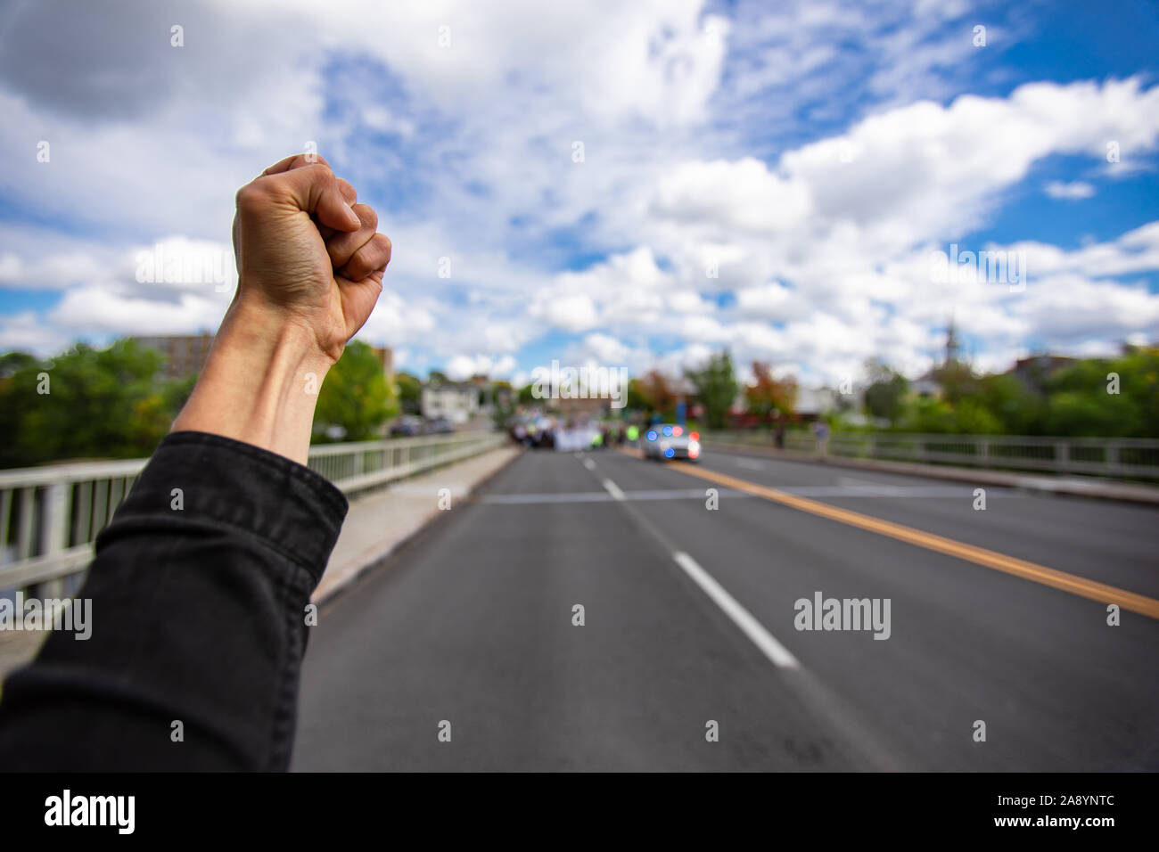 First person perspective and Selective focus on man fist raised during ...