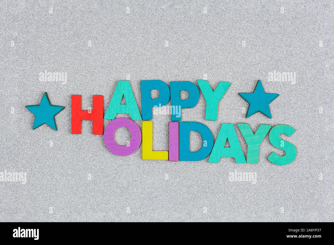 Happy Holidays colorful text on silver glitter background Stock Photo ...