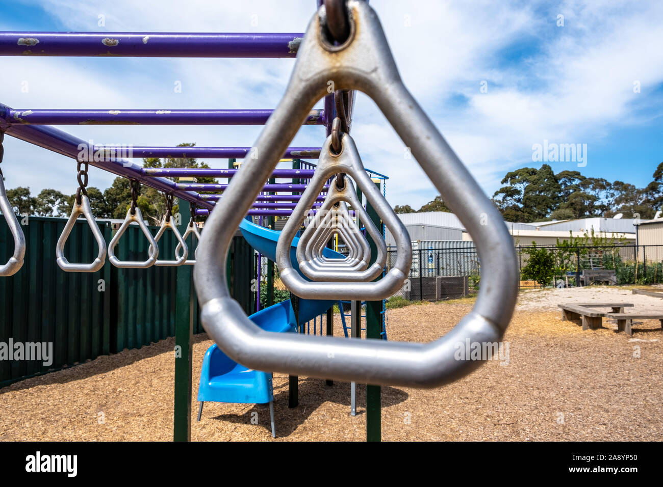 Triangular monkey bars closeup on kids playground Stock Photo - Alamy