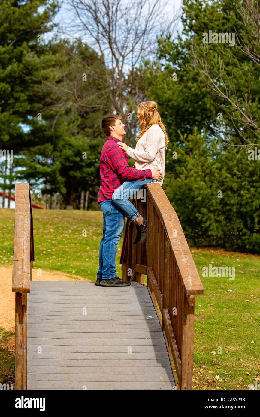 Sitting on a railing hi-res stock photography and images - Alamy
