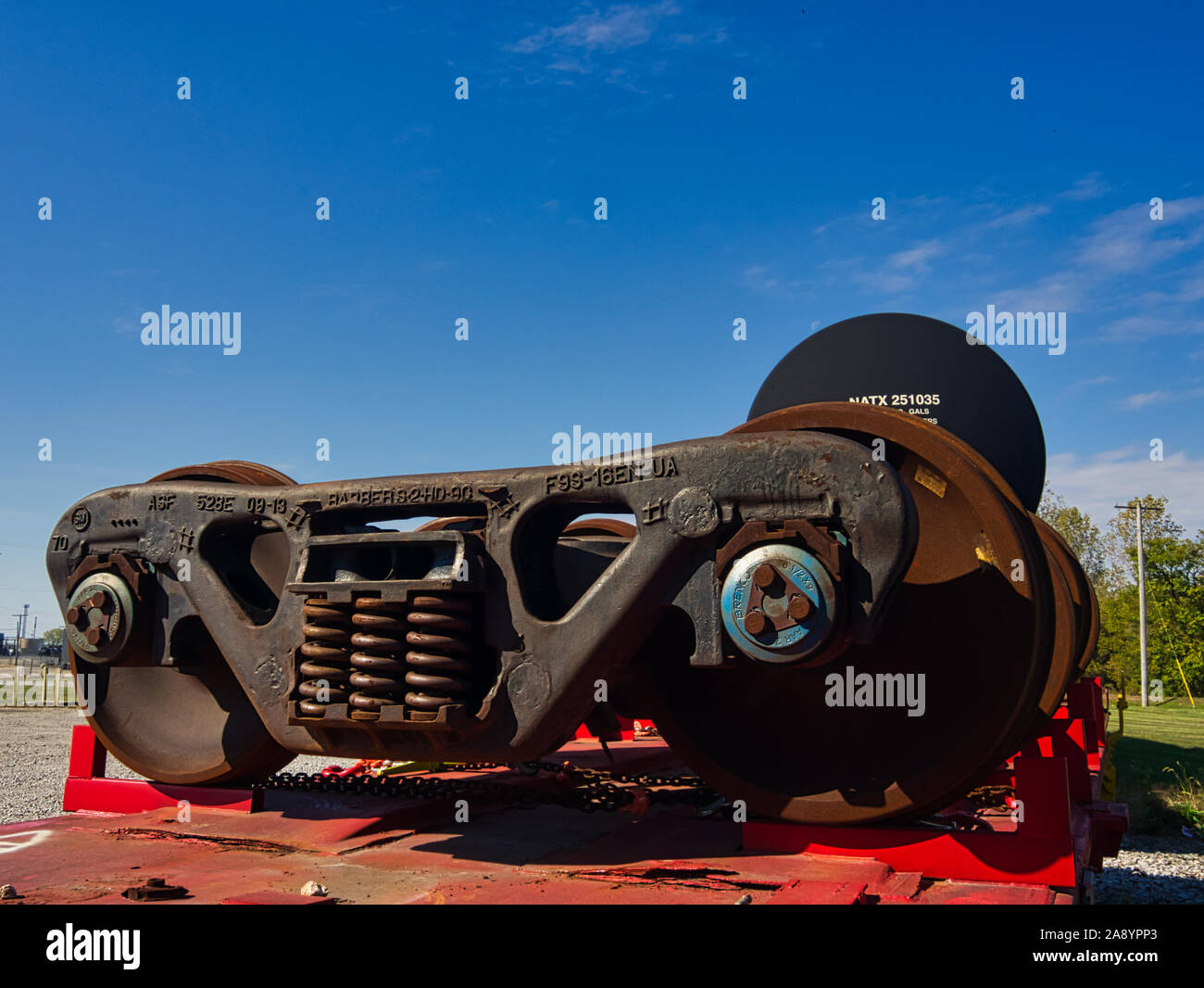 Railroad "trucks" on flatbed railroad car Stock Photo - Alamy