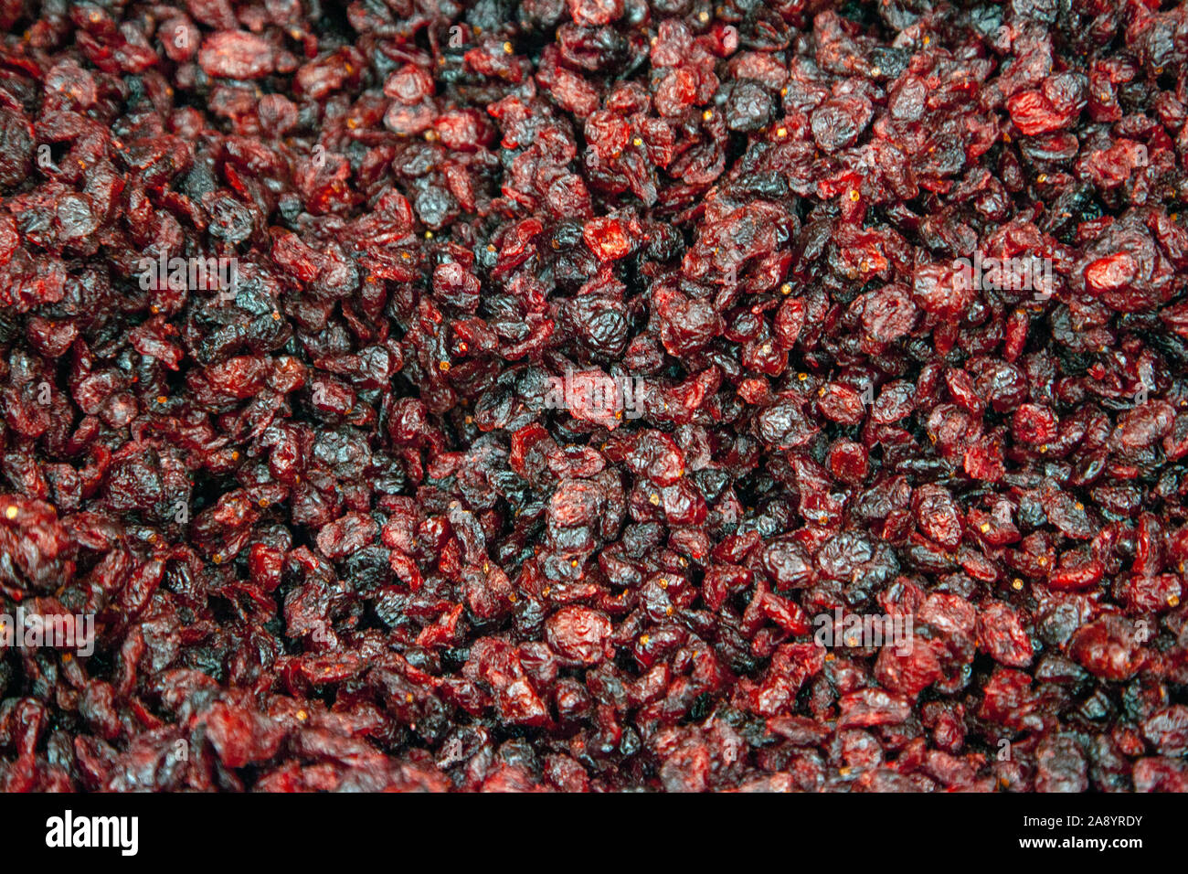 sweet chewy brown raisin fruit in a bin ready for eating Stock Photo ...