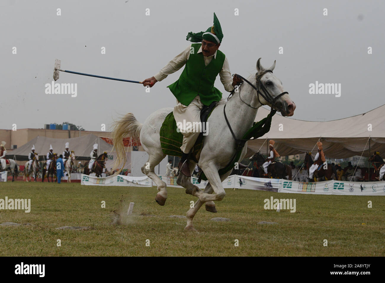 Pakistani horse and camel rider player in action during third Sarsabz ...
