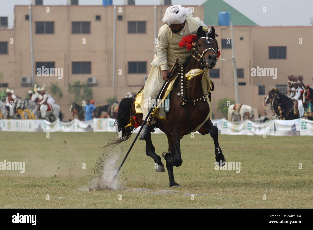 Pakistani horse and camel rider player in action during third Sarsabz ...