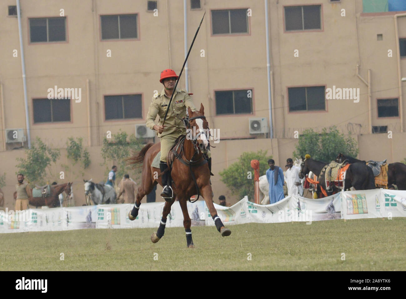 Pakistani horse and camel rider player in action during third Sarsabz ...