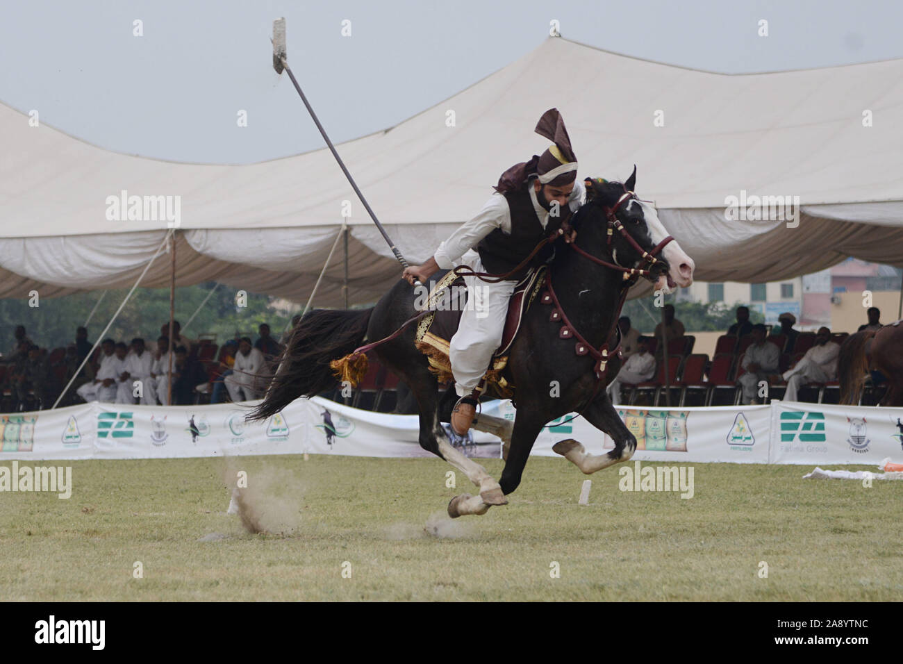 Pakistani horse and camel rider player in action during third Sarsabz ...