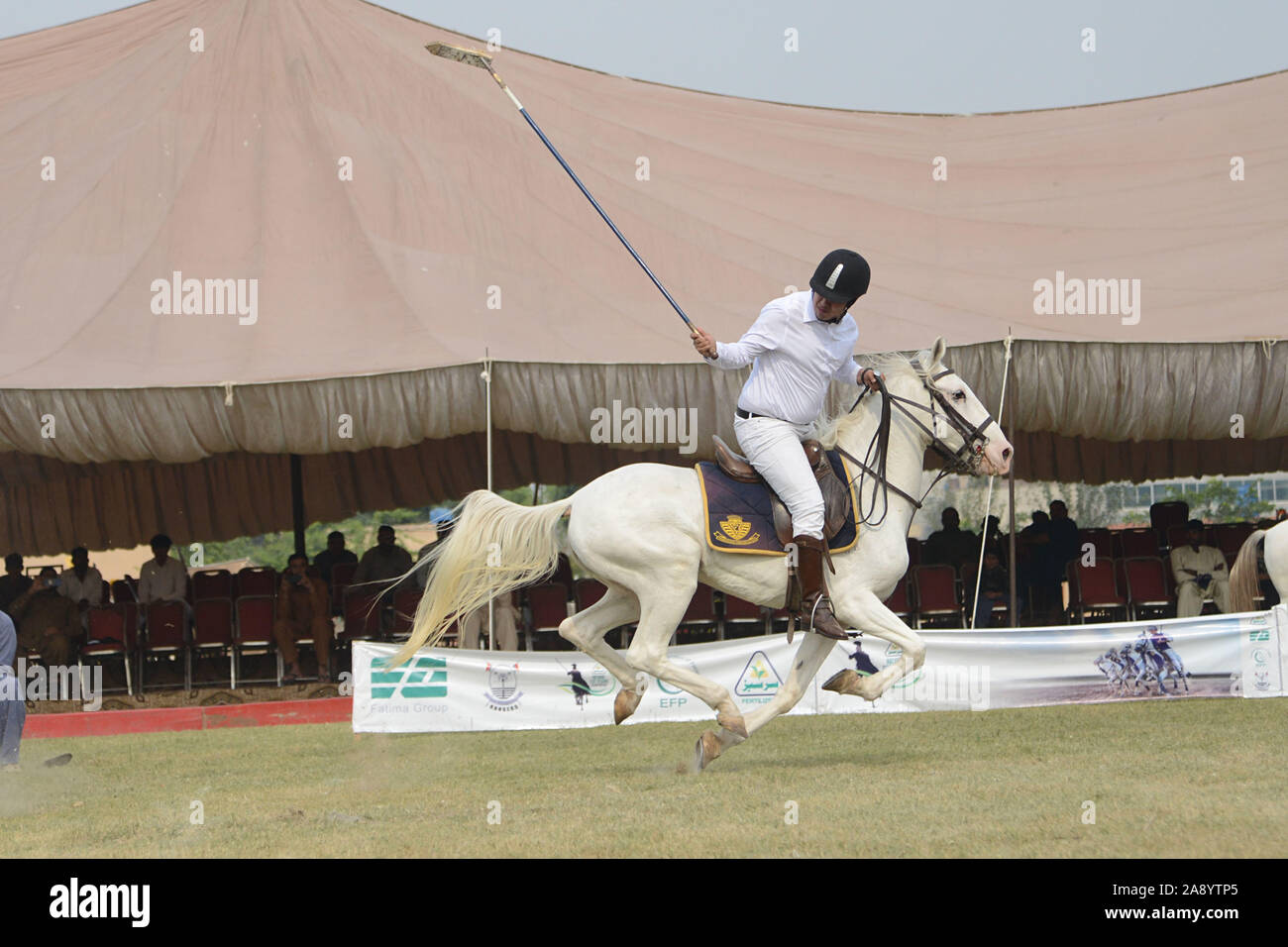 Pakistani horse and camel rider player in action during third Sarsabz ...