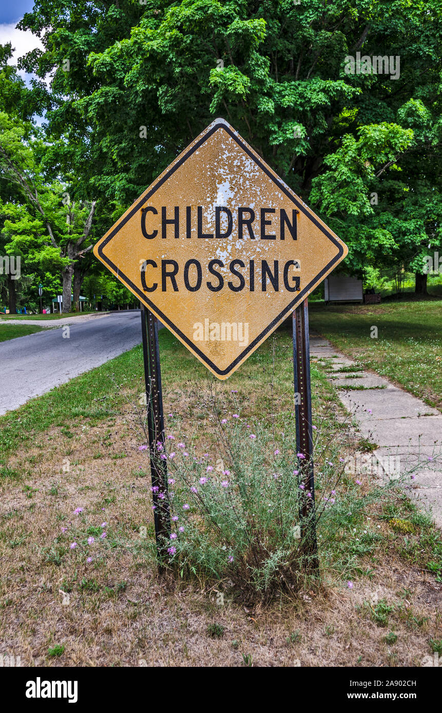 Cracked and weathered sign for Children Crossing the street Stock Photo ...