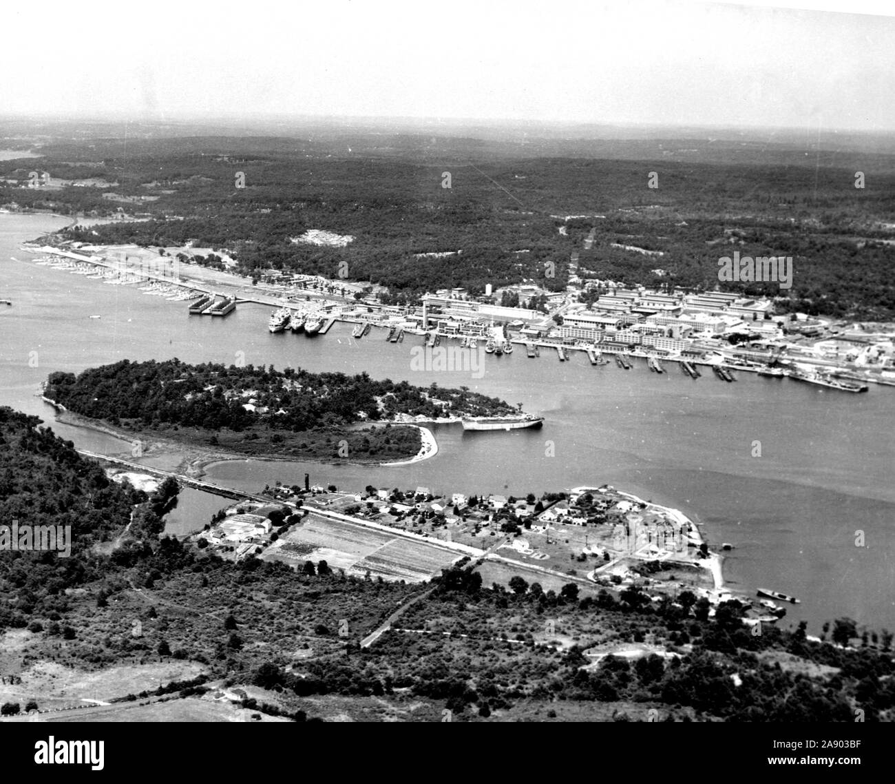 This photograph depicts an aerial view of the submarine base located on ...