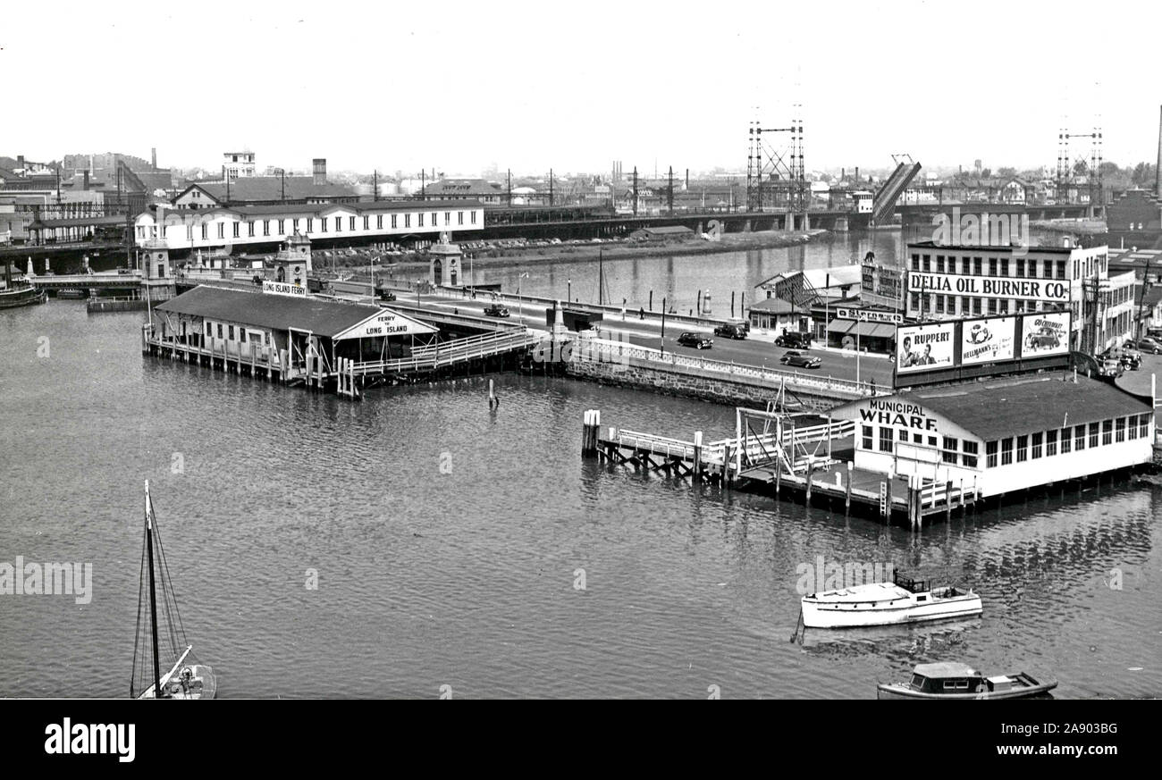 This photograph depicts a low aerial view of the wharves in the upper ...