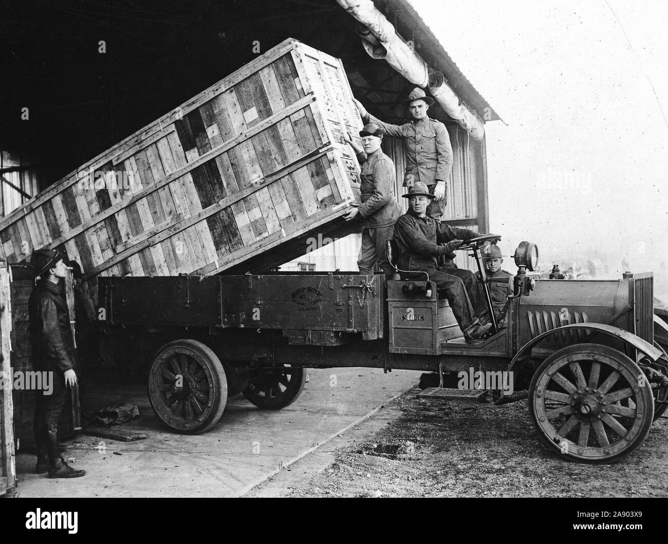 Motor transportation of Aeroplanes. A completed aeroplane leaving a U.S ...