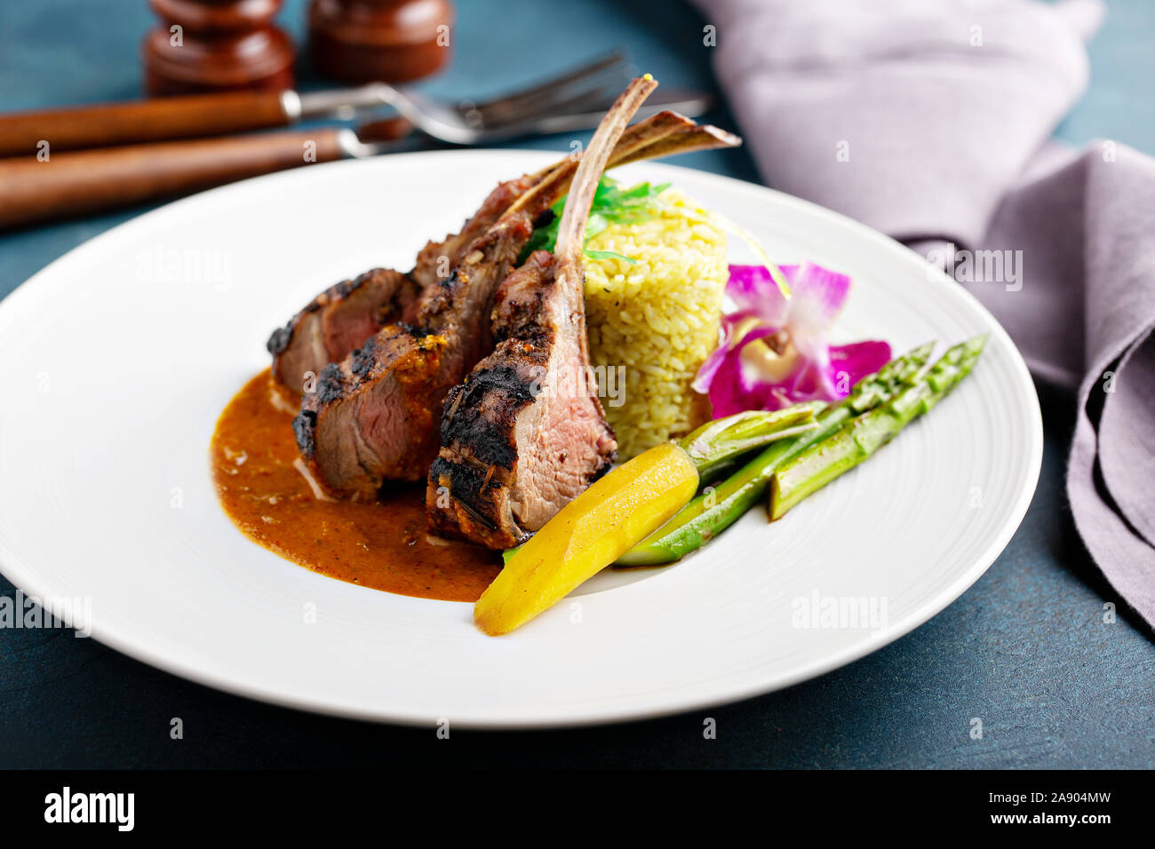 Lamb chops with fried rice and vegetables Stock Photo - Alamy