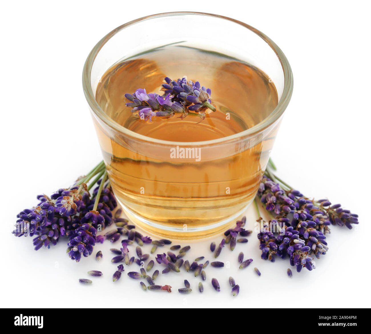 Lavender tea with flower over white background Stock Photo - Alamy