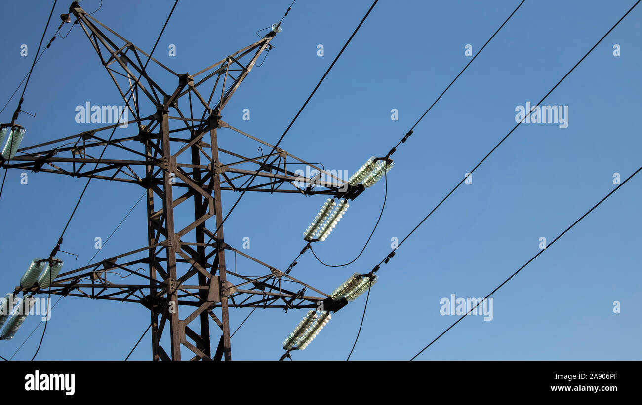 Metal electric pole and high voltage power lines Stock Photo - Alamy