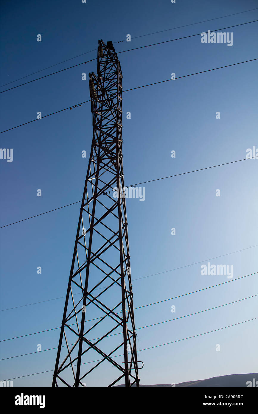 Metal electric pole and high voltage power lines Stock Photo - Alamy