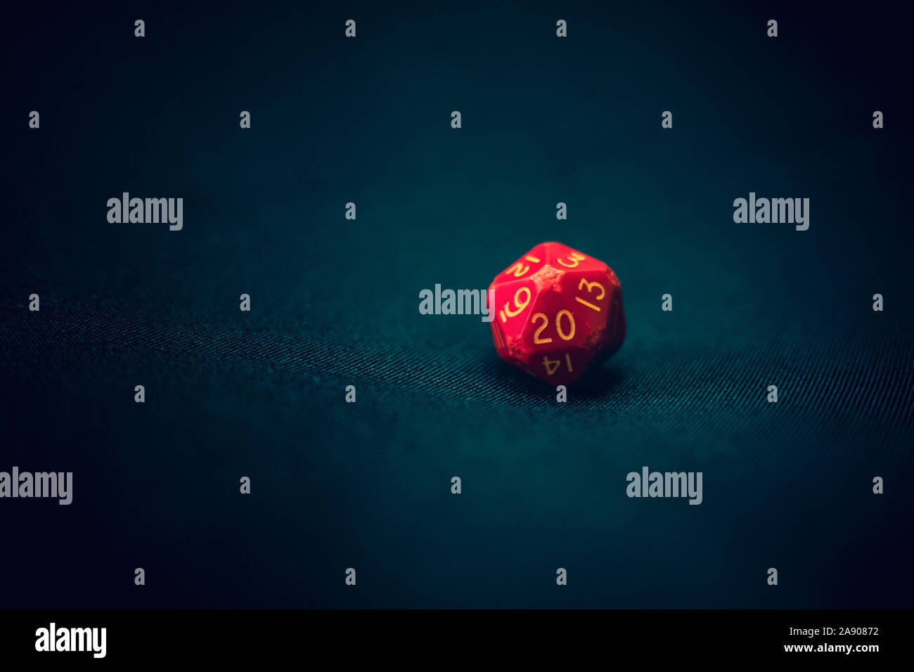 old damaged 20 sided die with 20 face the camera Stock Photo - Alamy