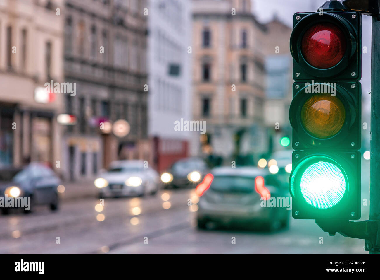 A city crossing with a semaphore. Green light in semaphore - image ...