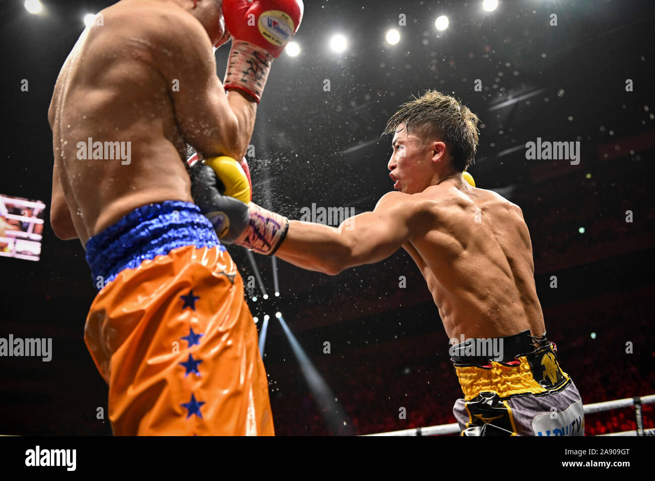 Naoya Inoue of Japan (R) and Nonito Donaire of Philippines fight in the ...