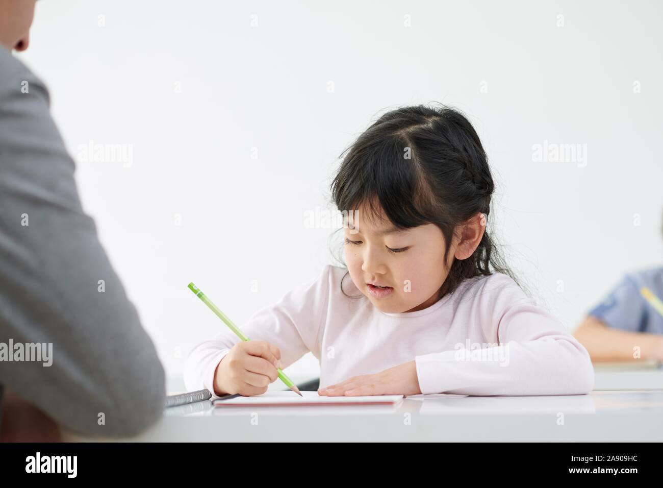 Japanese elementary school kid with teacher Stock Photo - Alamy