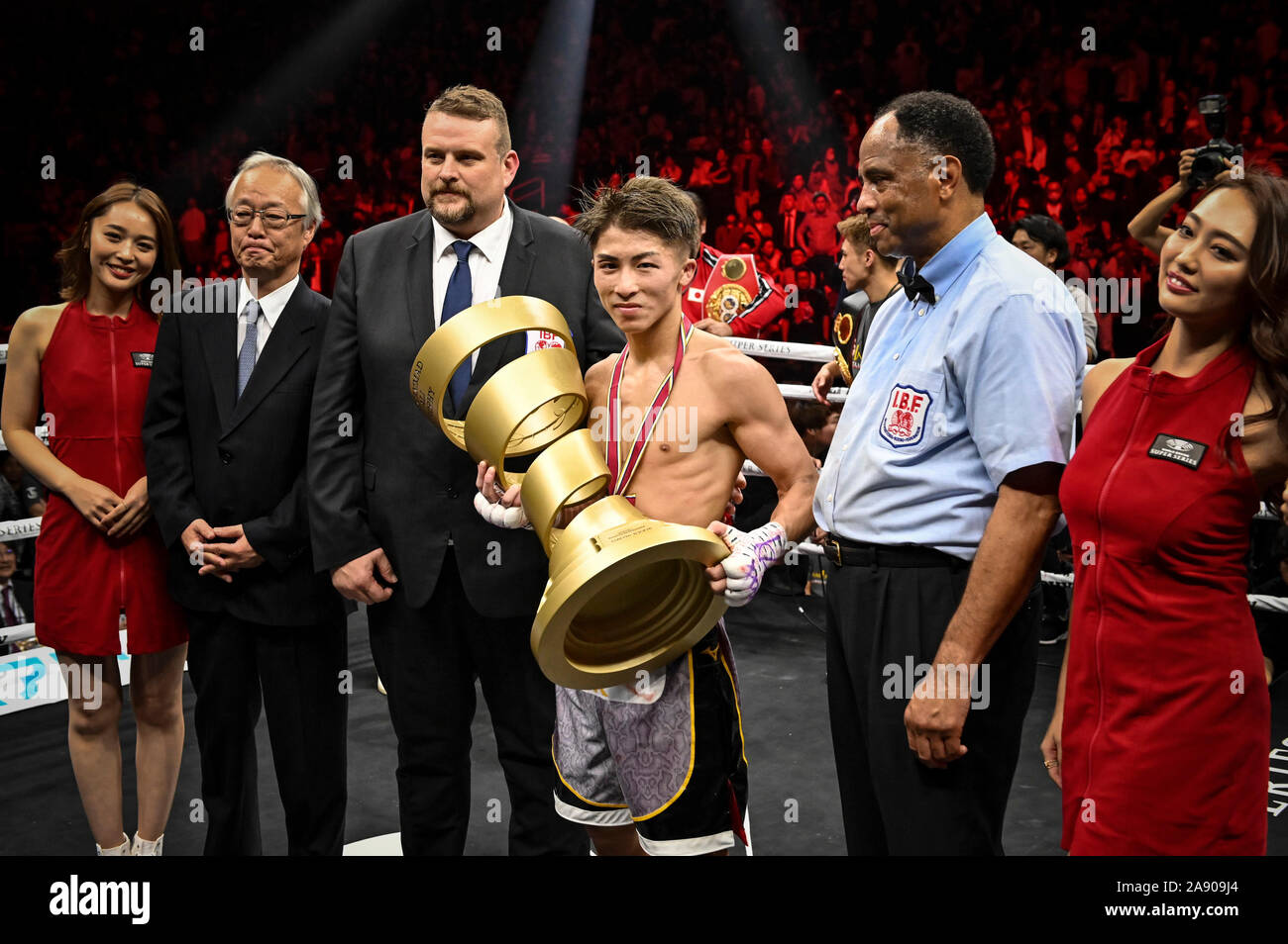 Naoya Inoue of Japan poses with the Muhammad Ali Trophy after winning ...